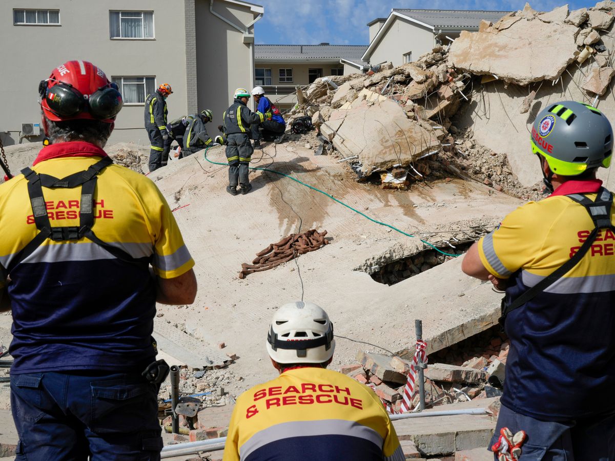 Rescue effort boosted as survivor found after South Africa building ...