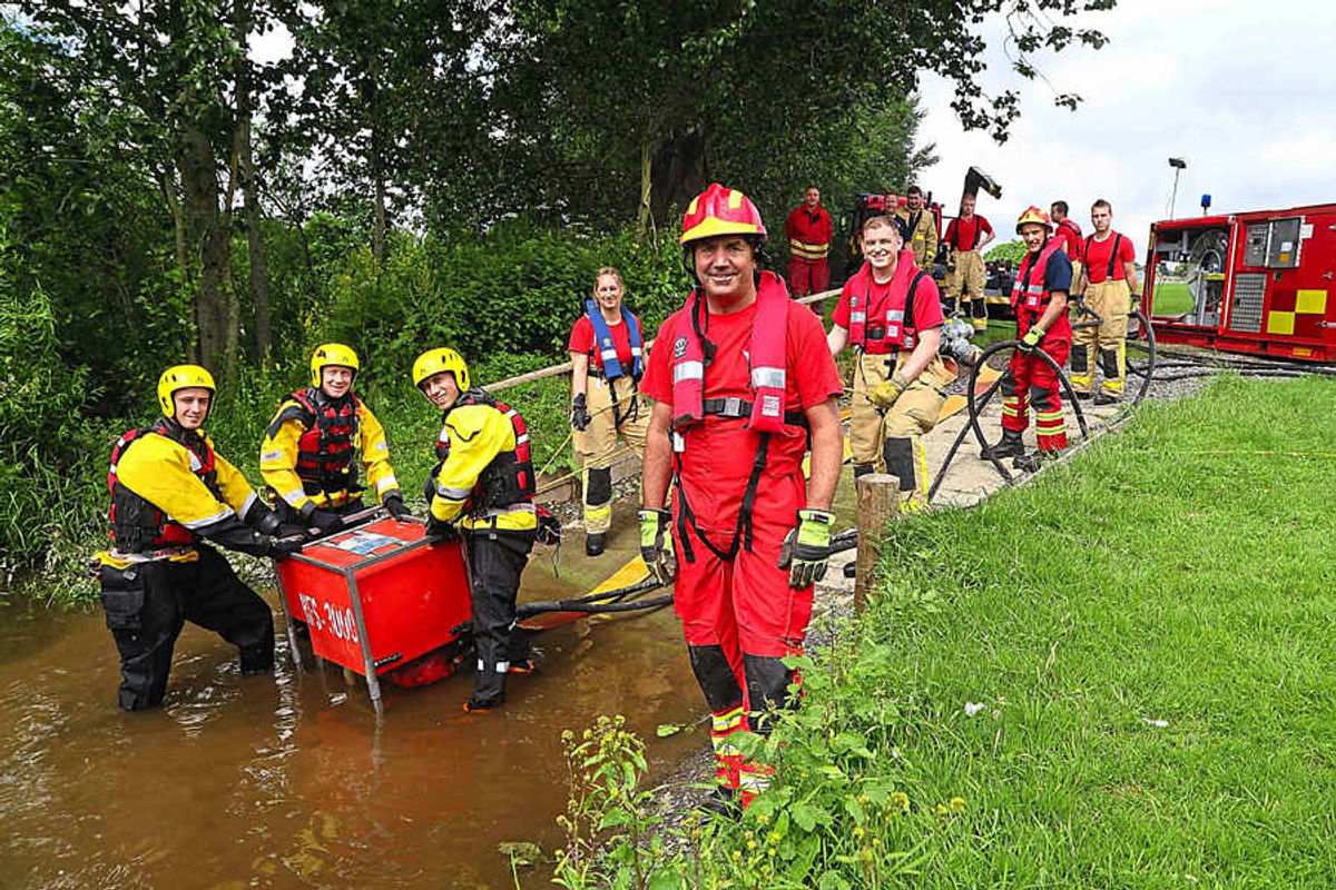 Shropshire firefighter Mac helps keep the flooding at bay | Shropshire Star