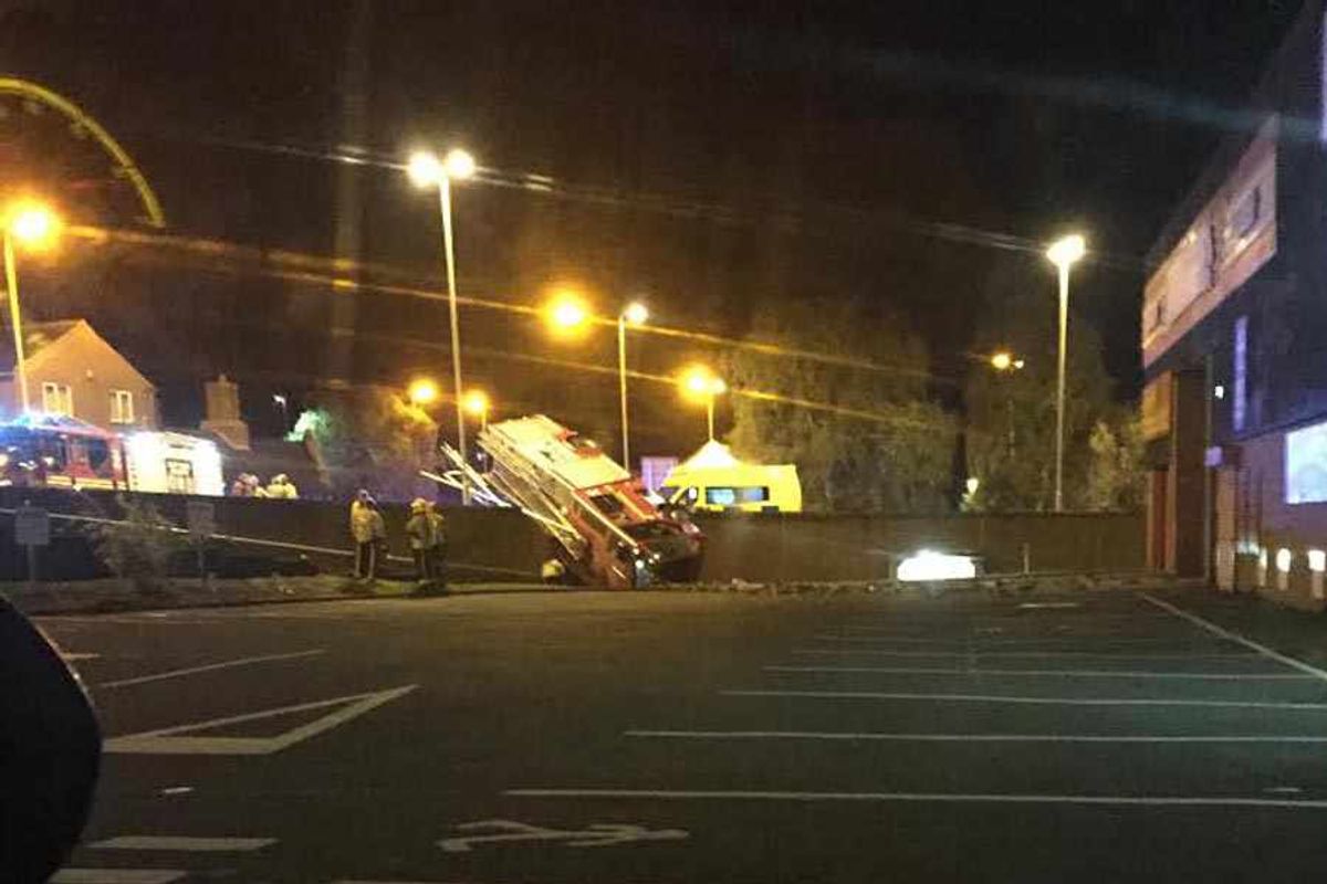 Five firefighters injured after FIRE ENGINE crashed through a wall on ...