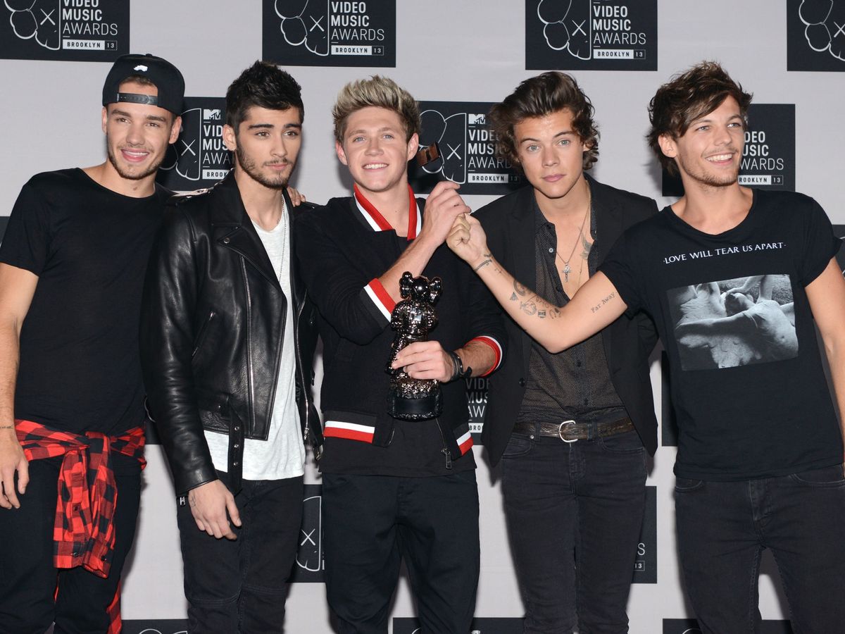 Louis Tomlinson hints at One Direction reunion during chat with ...