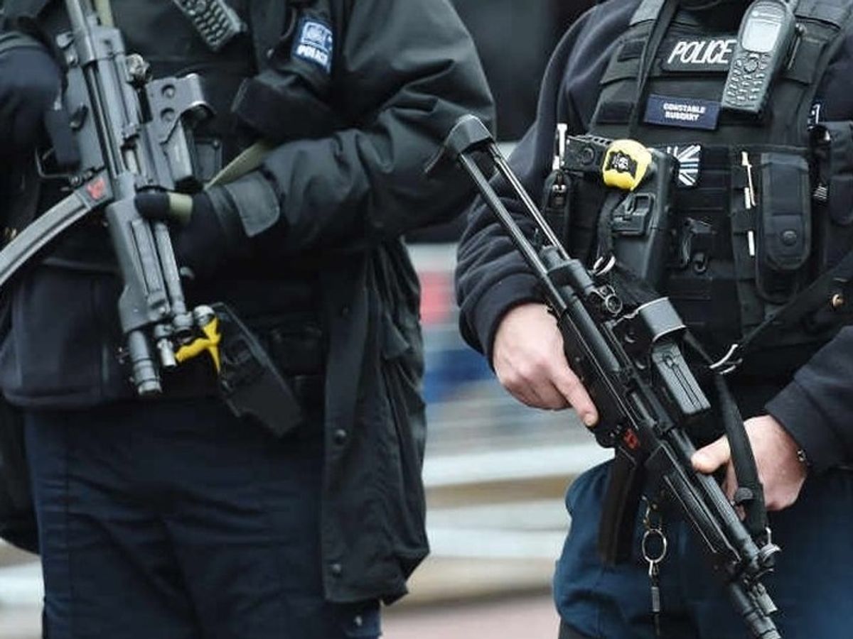 Men arrested after threatening armed police in car with crowbar ...