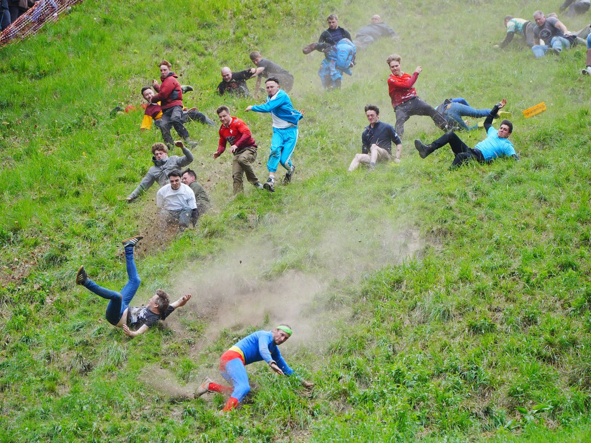 Gloucestershire cheese rolling race won again by German YouTuber Tom ...