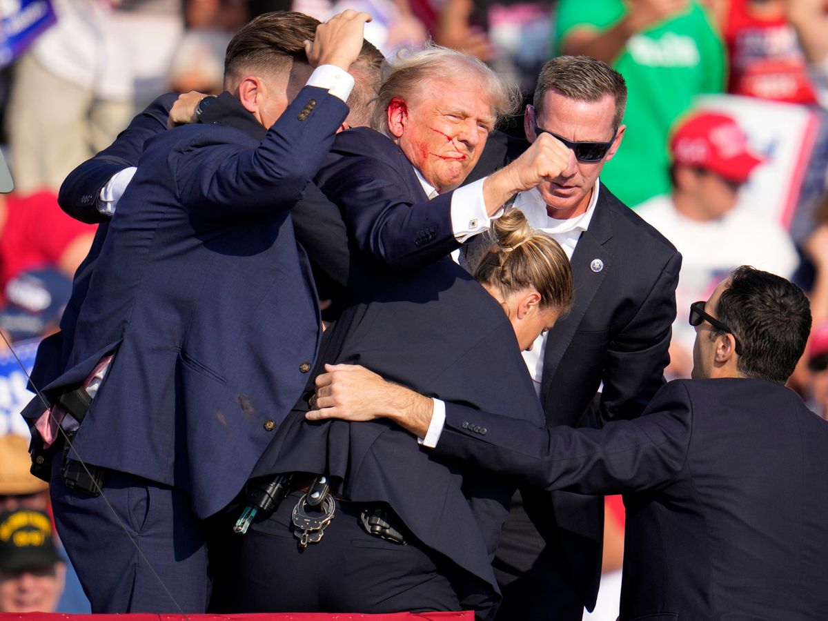 Donald Trump rushed off stage after gunshots at Pennsylvania rally ...