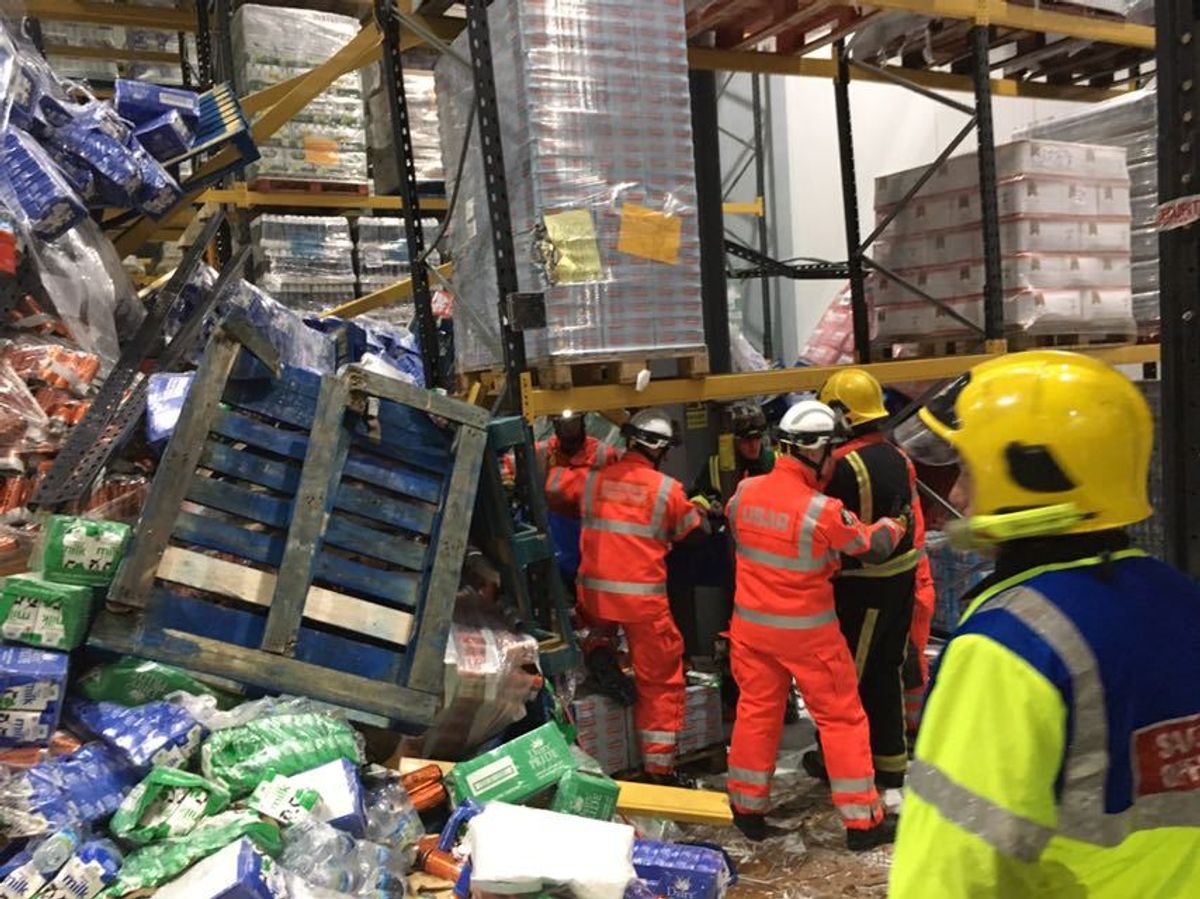Trapped man rescued after racking collapses at Halesowen food warehouse ...