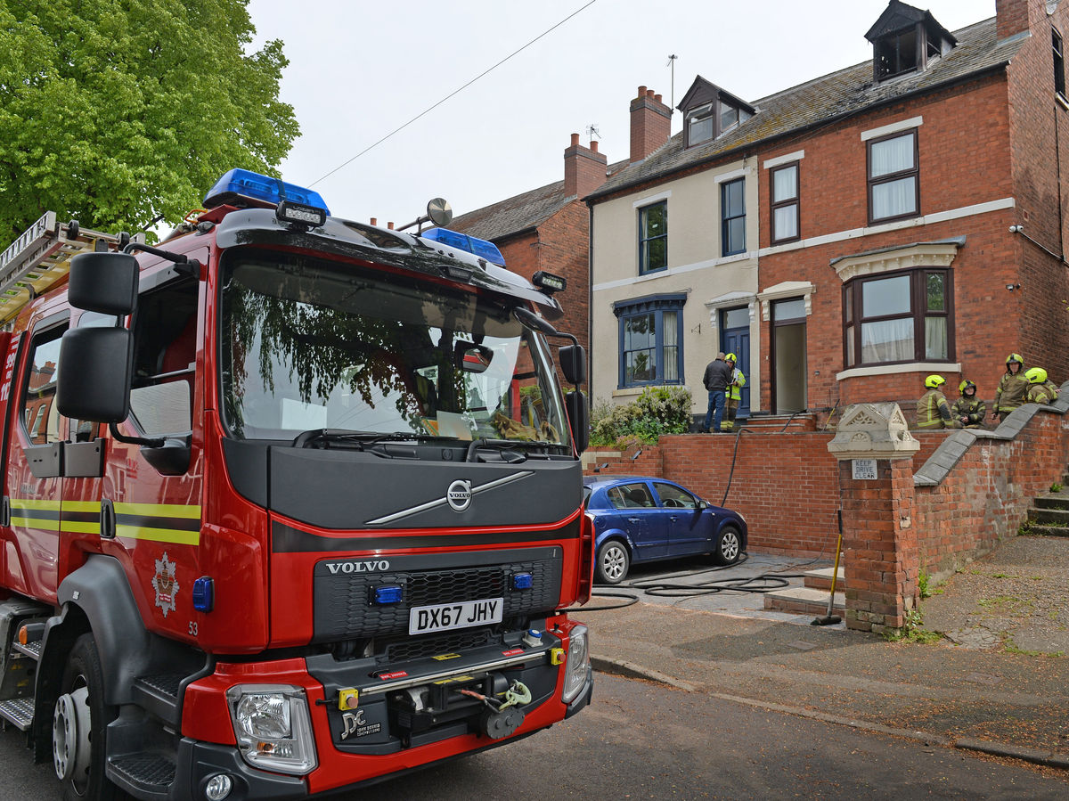 Road sealed off as fire crews battle blaze in attic at Walsall house ...