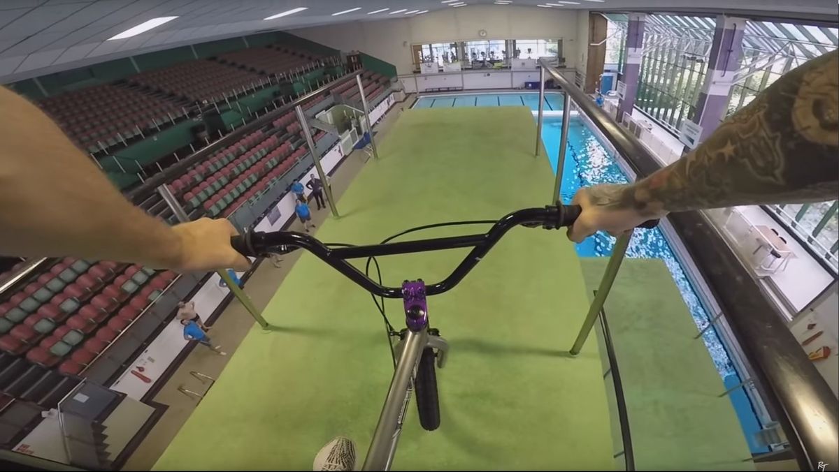 'Selfish and foolhardy': Watch as man rides BMX off Walsall swimming ...