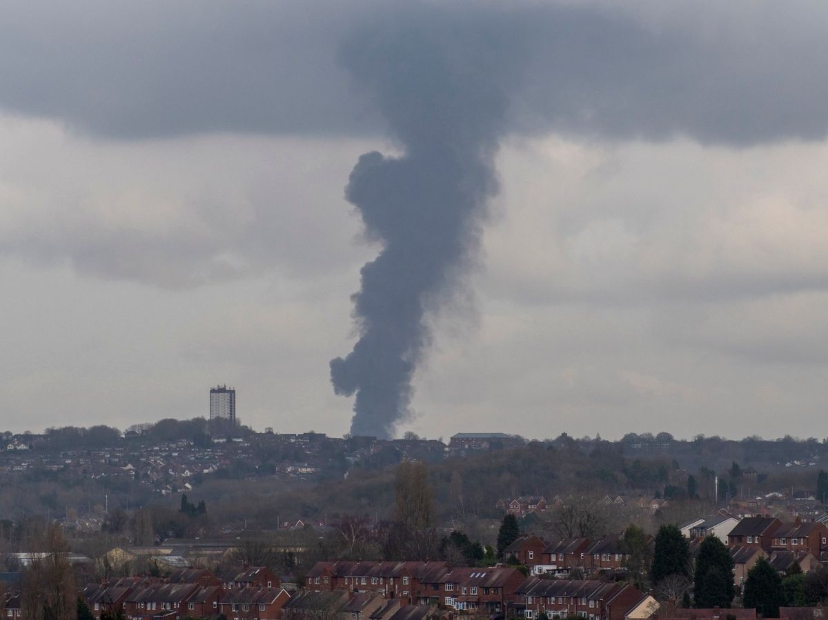 Large plastic fire tackled, with smoke plume visible for miles ...