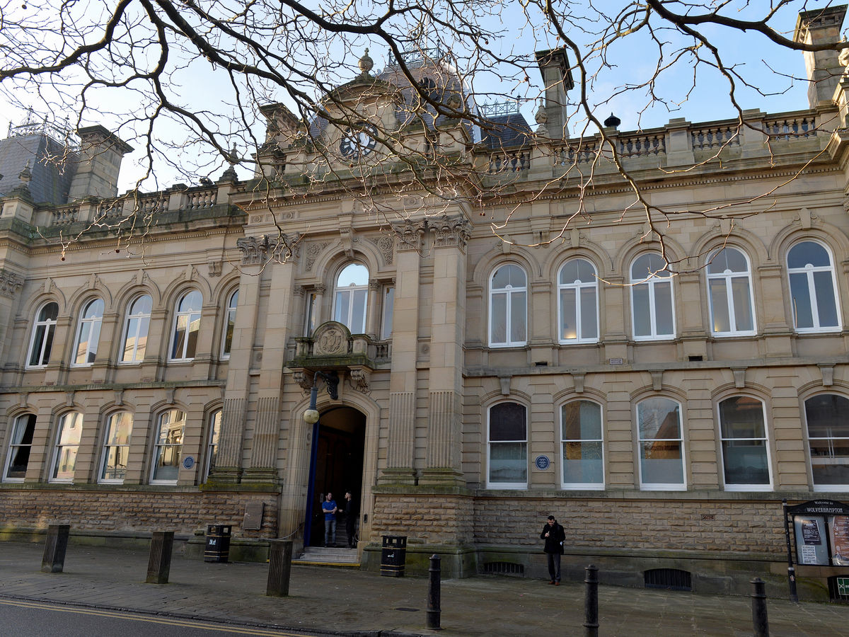 Two in court charged with firearms offences after police raid in ...