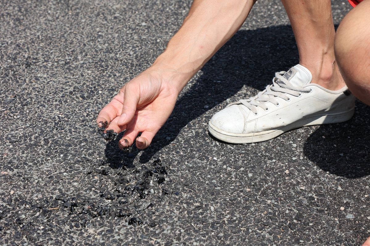 UK Heatwave: Road in Cannock turns to molten tar and sticks to tyres ...