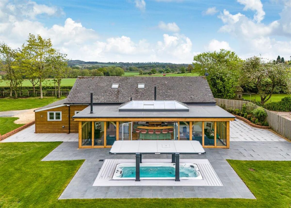 Former West Midlands village hall with jacuzzi swim spa and expansive ...