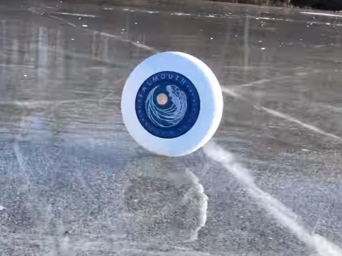 This frisbee gliding endlessly across a frozen pond will mesmerise you ...