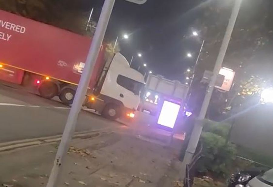 See the moment stolen earthmover smashes past lorry on Wolverhampton ...