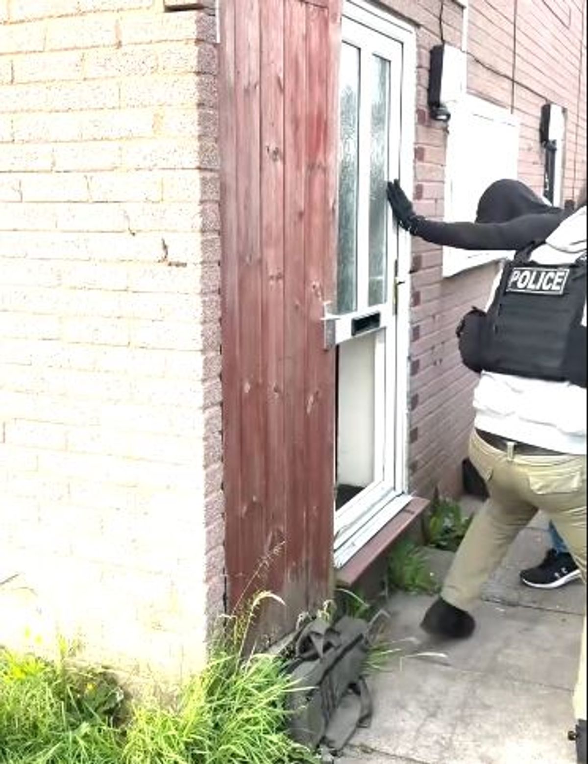 Watch: Dramatic footage shows police officers breaking into properties ...