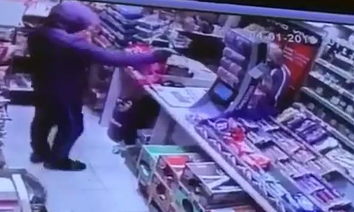 WATCH: Armed robber holds up shop at gun point during terrifying raid ...