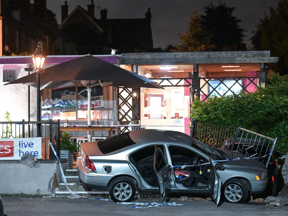 Four hurt and shots fired as car driven at people outside pub after ...