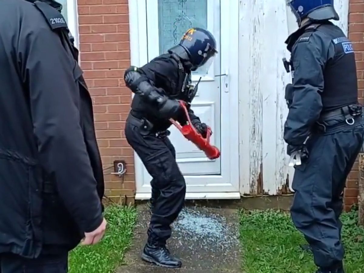 Watch Telford police break down Brookside cannabis farm door with 'big ...