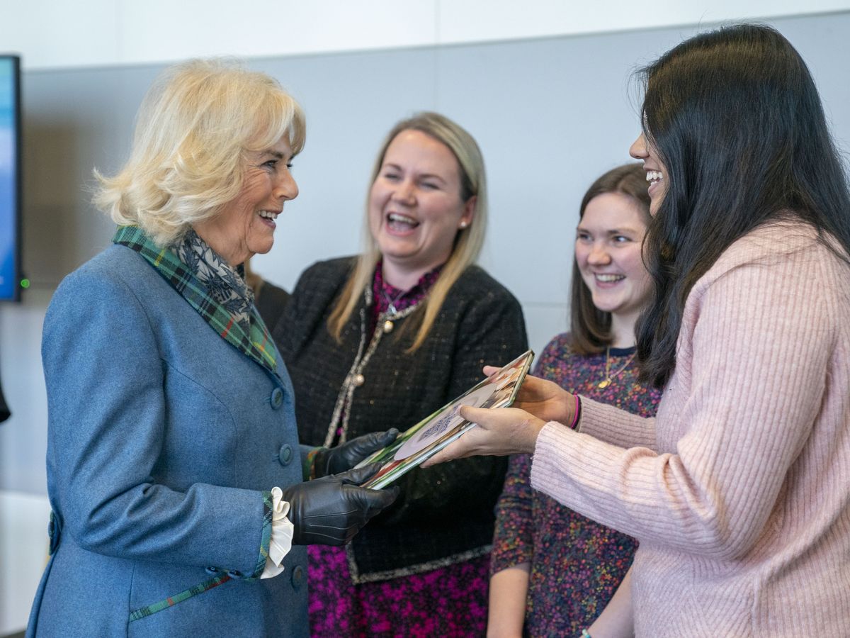 Camilla meets students, composer and professional footballer in ...