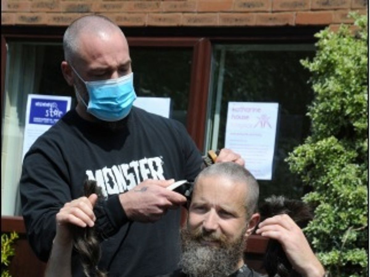 Close shave for police officer haircut raises thousands for charity ...