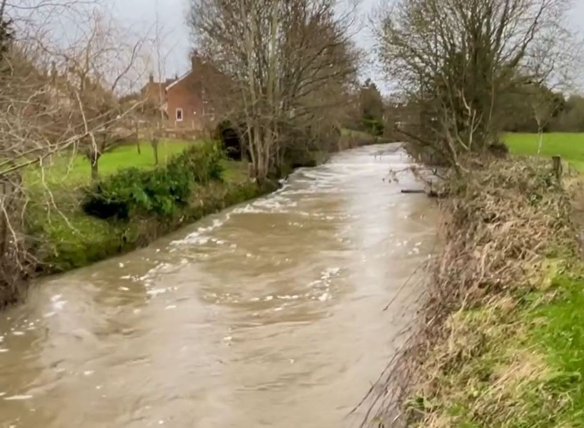 Watch: 600 million litres of water a day flow over weir as storm waters ...