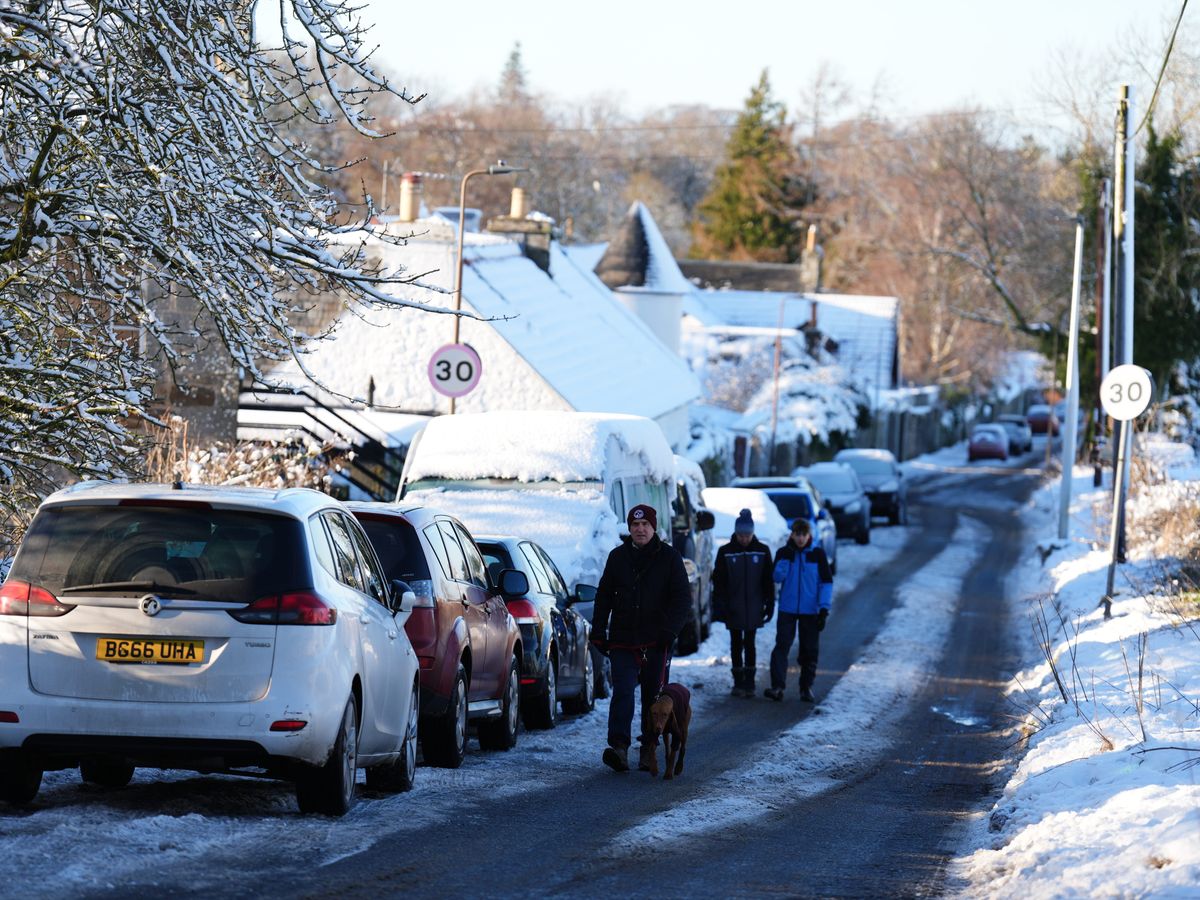 Heavy snow and freezing rain sweep in as amber warnings come into force ...