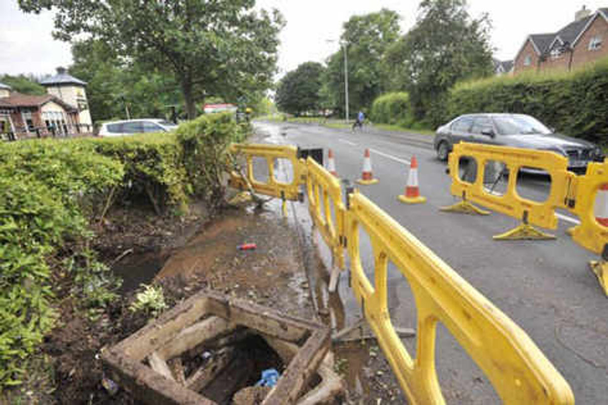 Water burst floods Telford road | Shropshire Star