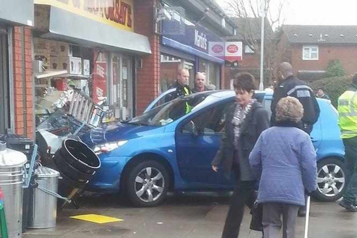 PICTURED: Car crashes into Wolverhampton shop window | Express & Star