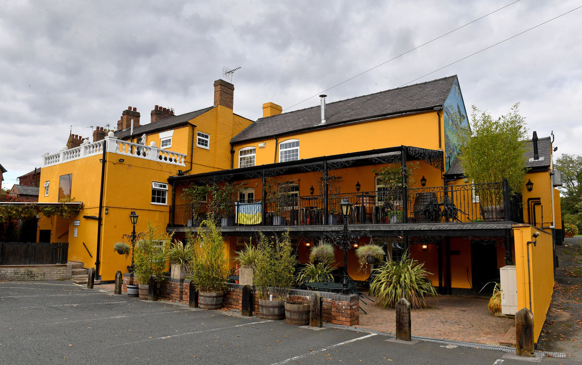 The bright yellow pub that's just as bold on the inside as it is on the ...