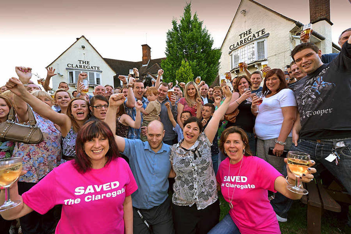 Regulars raise a glass to celebrate as The Claregate pub is saved ...