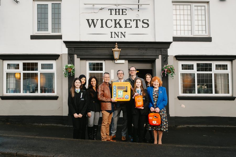 Defibrillator presented to Telford pub after six-year community ...
