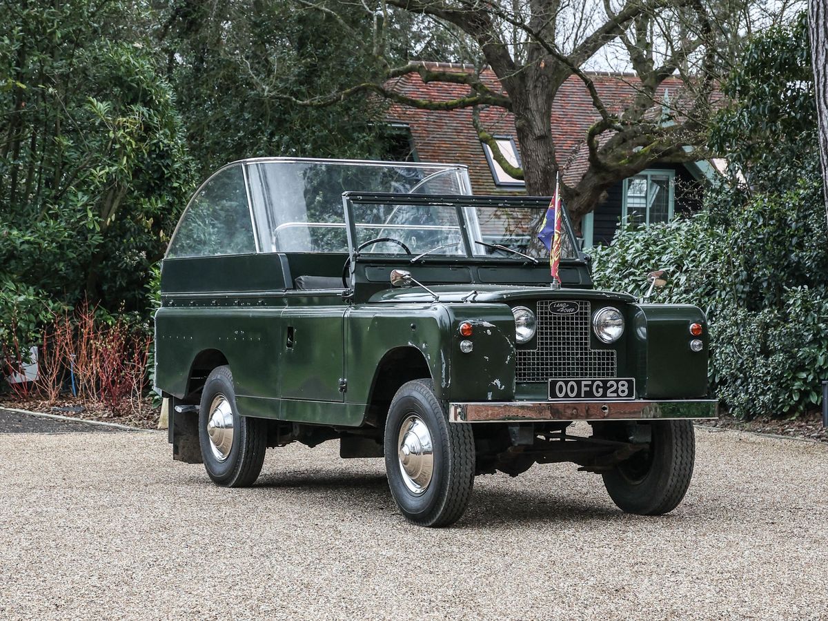 Ceremonial Land Rover used by the late Queen Elizabeth going under the ...