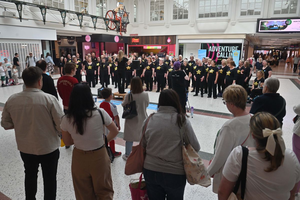 Watch: Shoppers in Telford surprised by flash-mob in aid of charity | Shropshire Star