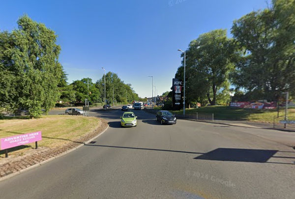 Fire truck overturns after crash with car on busy roundabout in ...