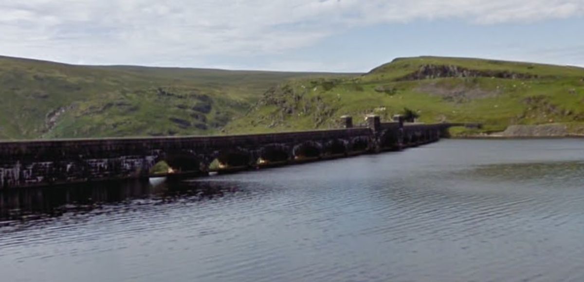 Death of unidentified man found in wetsuit at Powys reservoir 'not ...