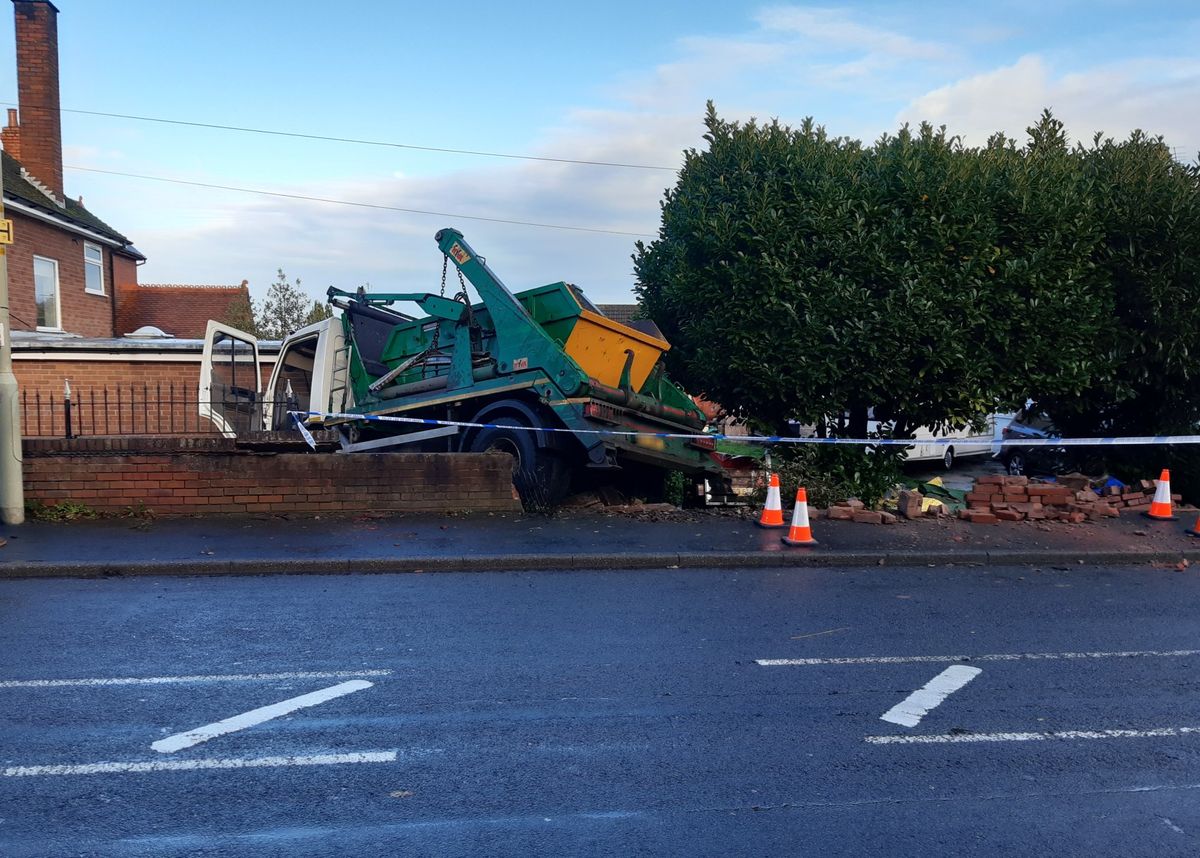 Skip lorry breaks through brick wall off busy Telford road | Shropshire ...