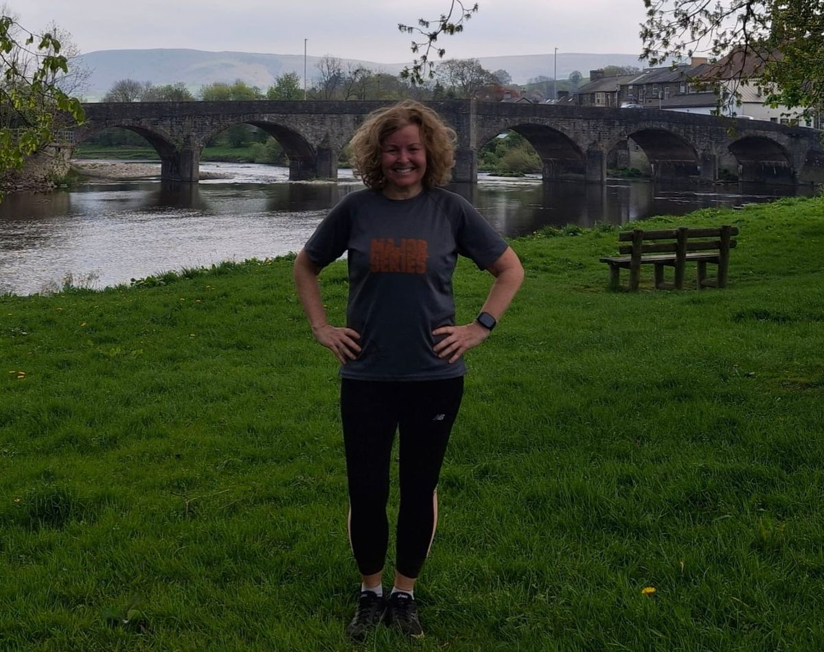 A woman ran a half marathon at a Builth Wells park to raise money for a ...
