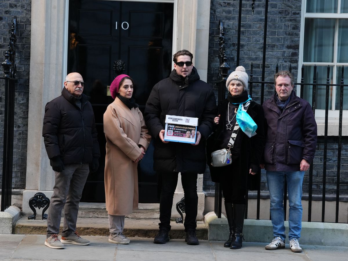 Family of UK couple detained in Iran and supporters hand petition to No ...