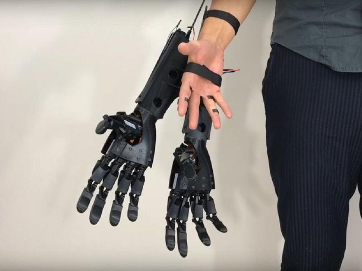 These extra robotic hands have been created to help with multitasking ...