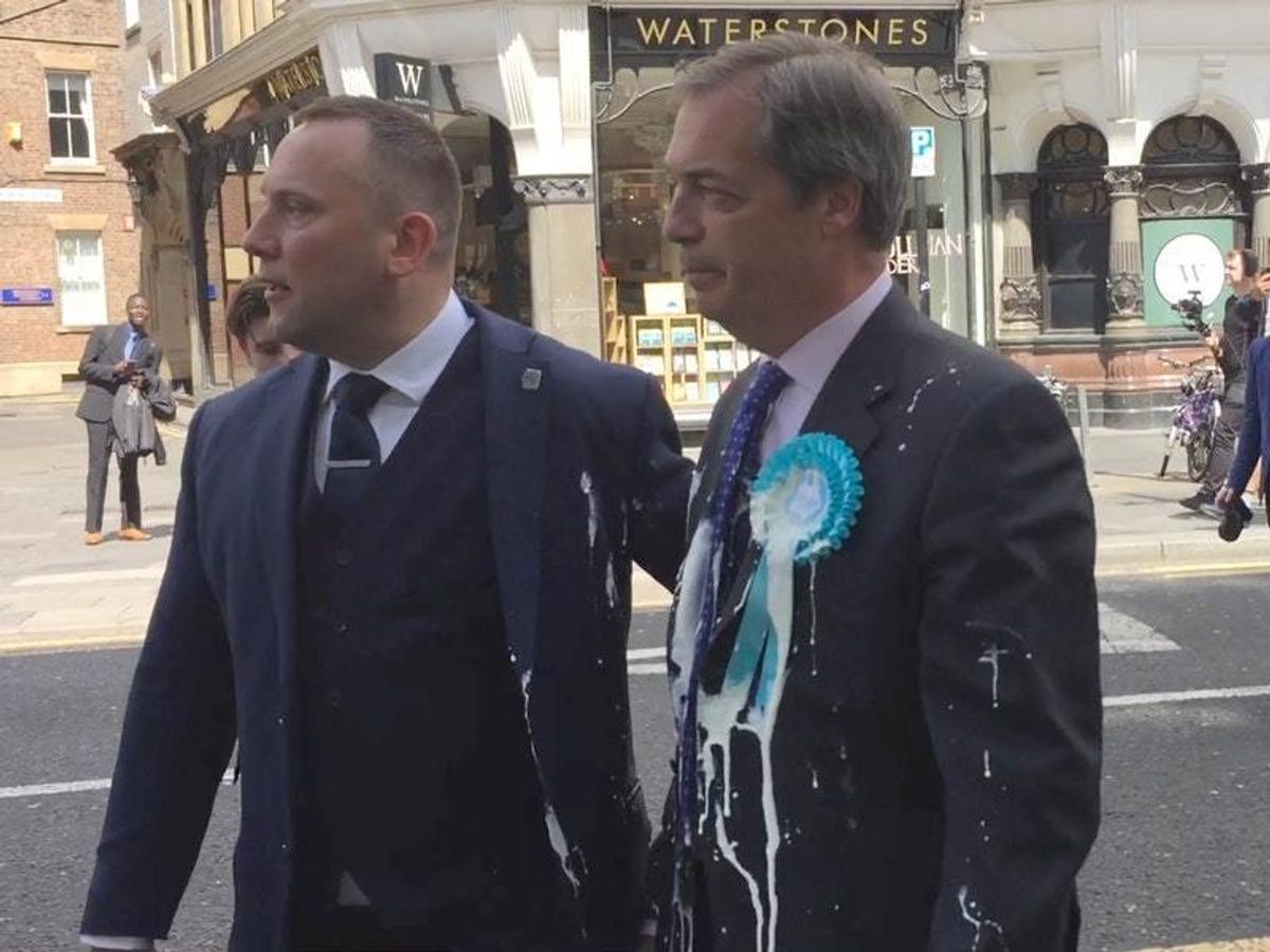 Man charged with common assault after Nigel Farage hit by milkshake ...