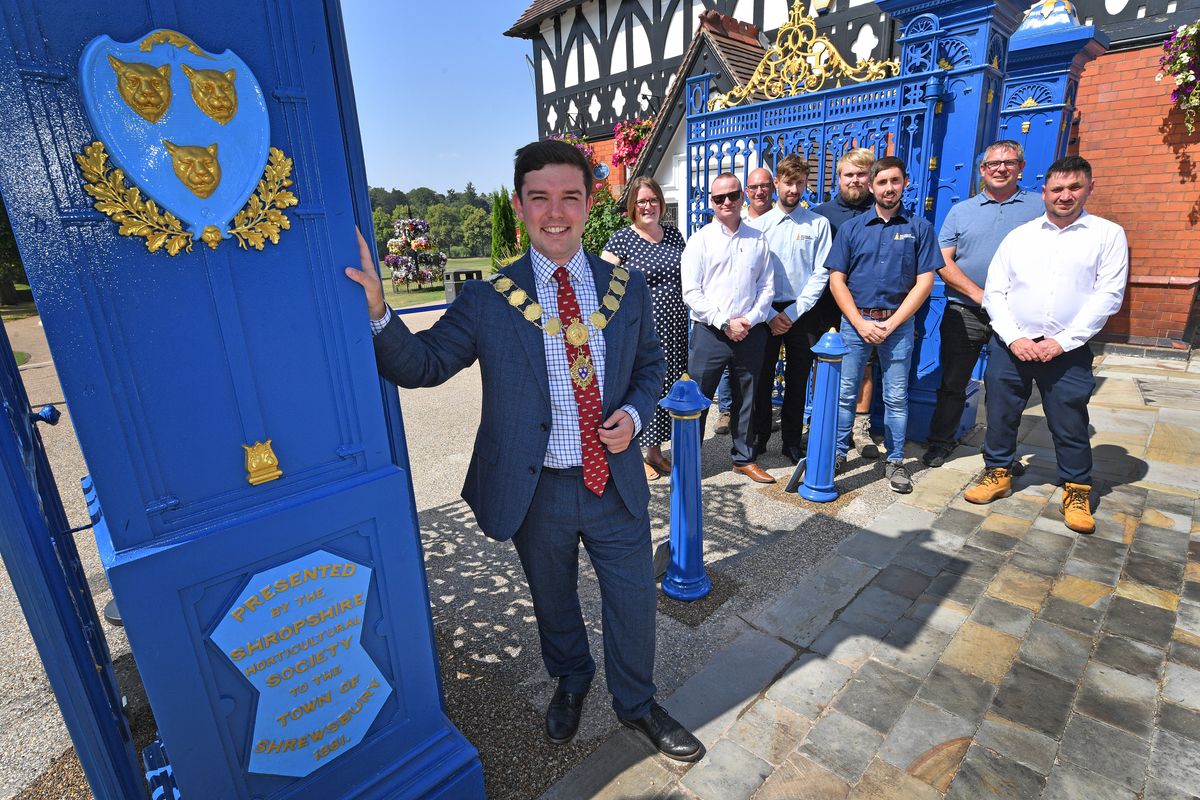 Quarry's historic blue gates celebrated after refurbishment for ...