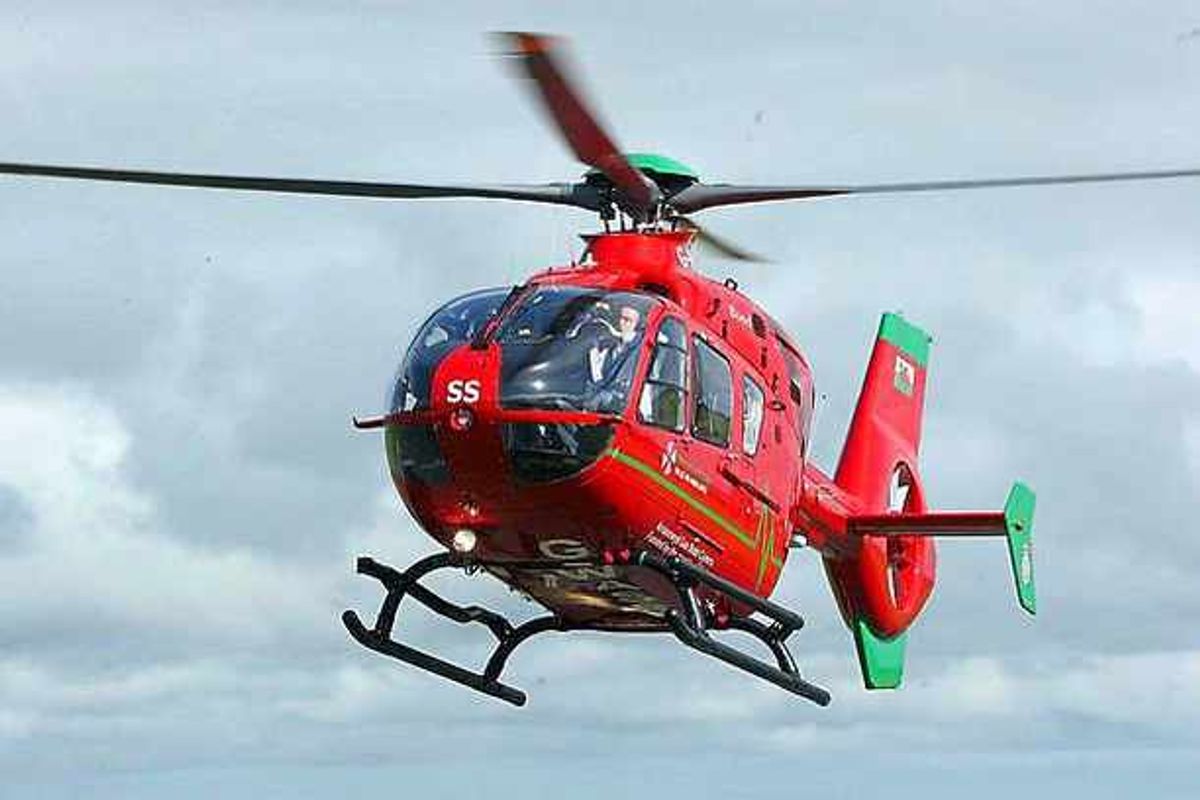 Man airlifted to hospital in 'serious condition' after falling ill at ...