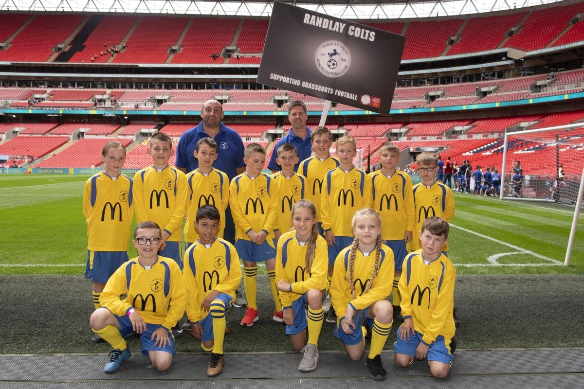 Telford's Randlay Colts walk out at Wembley ahead of Manchester City vs ...